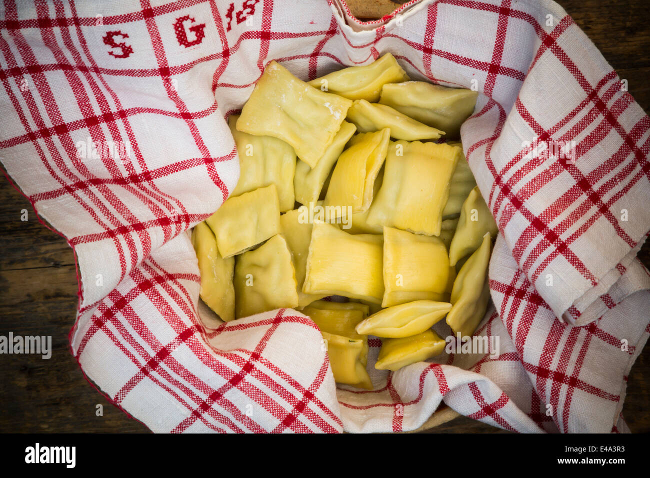 Swabian dumplings for soup on kitchen towel Stock Photo - Alamy