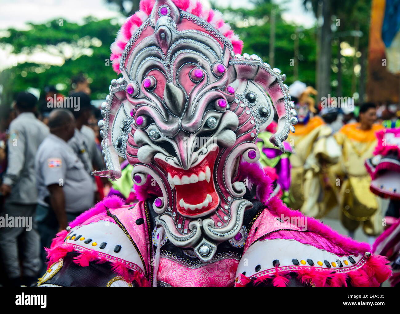 Colourful dressed masked man in the Carneval (Carnival) in Santo ...