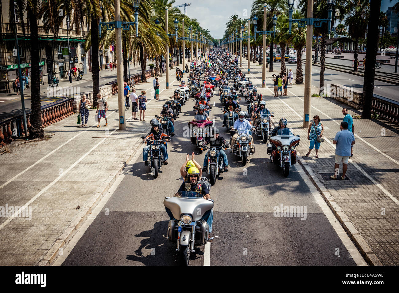 Barcelona, Spain. July 6th, 2014: Motorcyclists greet as they take part ...