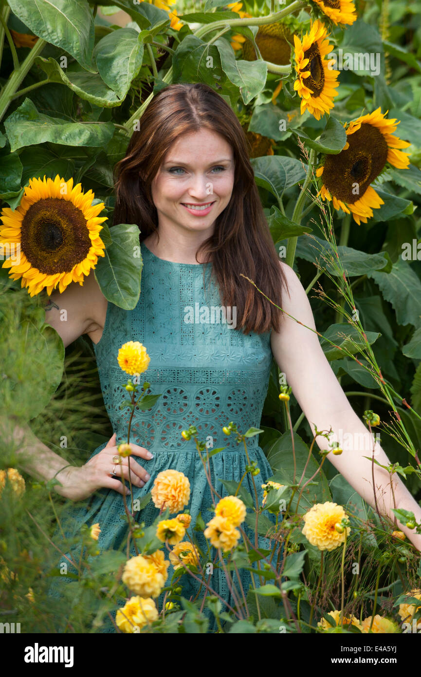 Hampton Court Palace, Surrey UK. 7th July 2014. Sophie Ellis-Bextor surrounded by sunflowers on ...