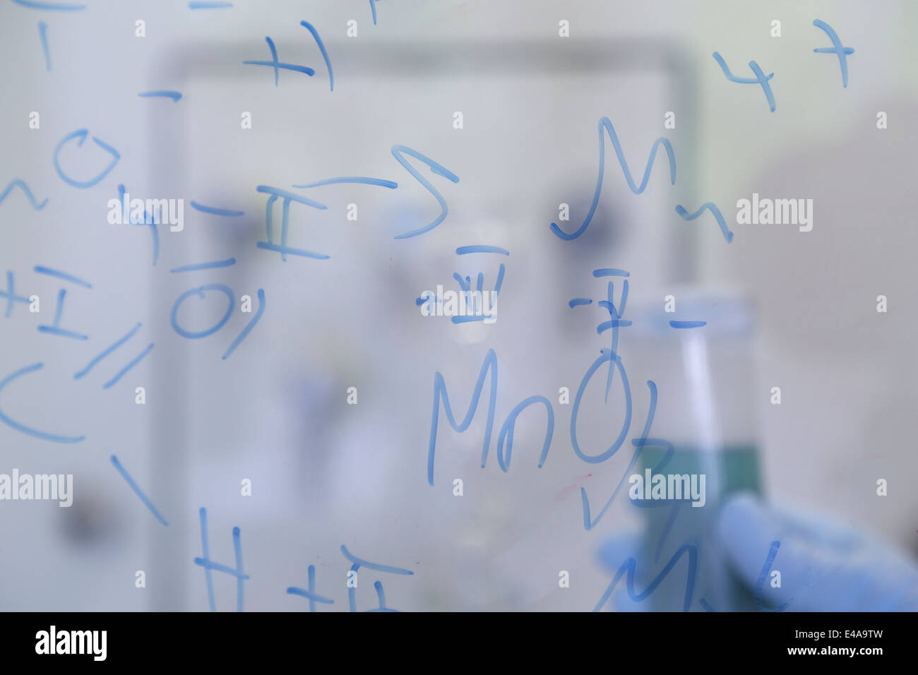 Formulas on glass pane in chemical laboratory Stock Photo - Alamy