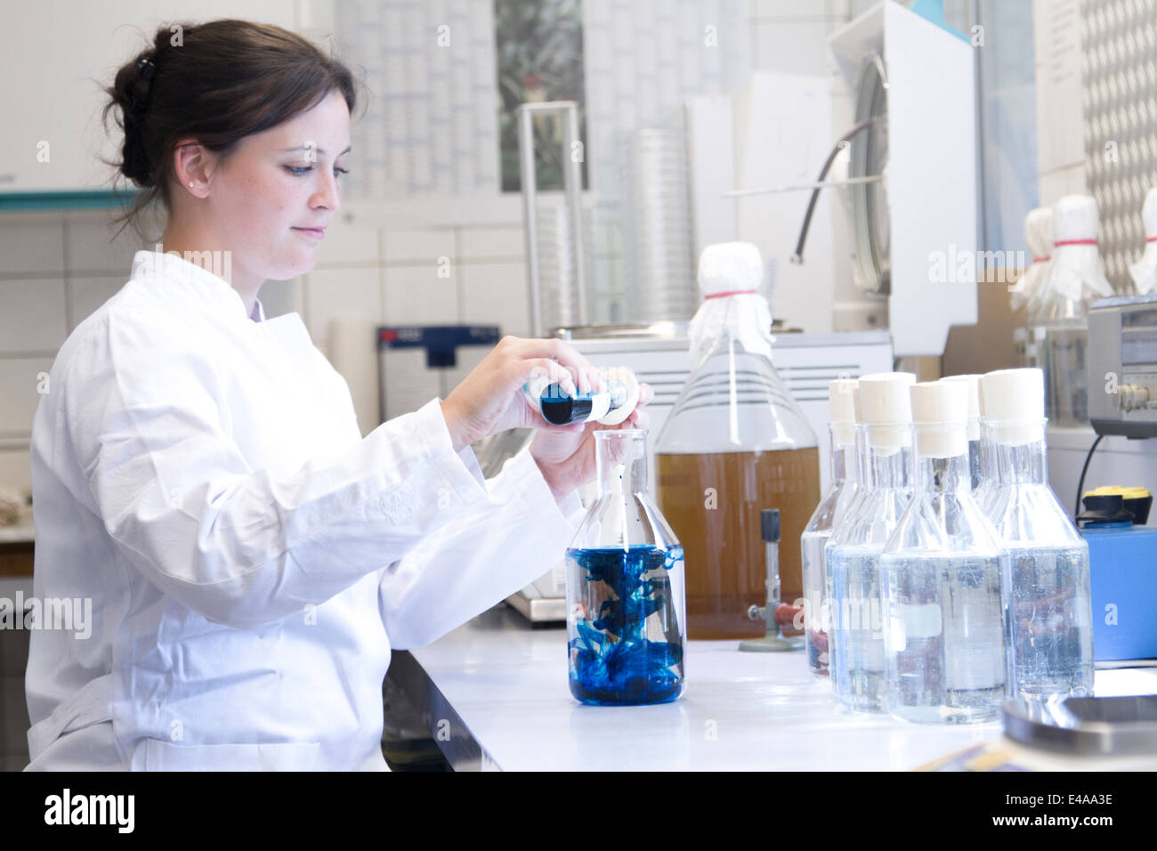 Female food analyst working in laboratory Stock Photo - Alamy