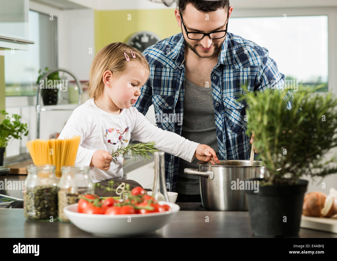 Father and daughter cooking in kitchen Stock Photo - Alamy
