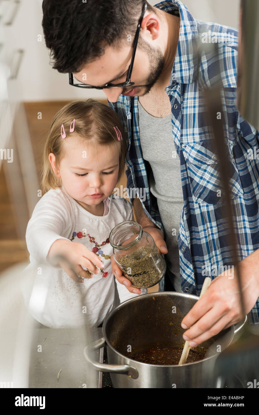 Father and daughter cooking in kitchen Stock Photo - Alamy