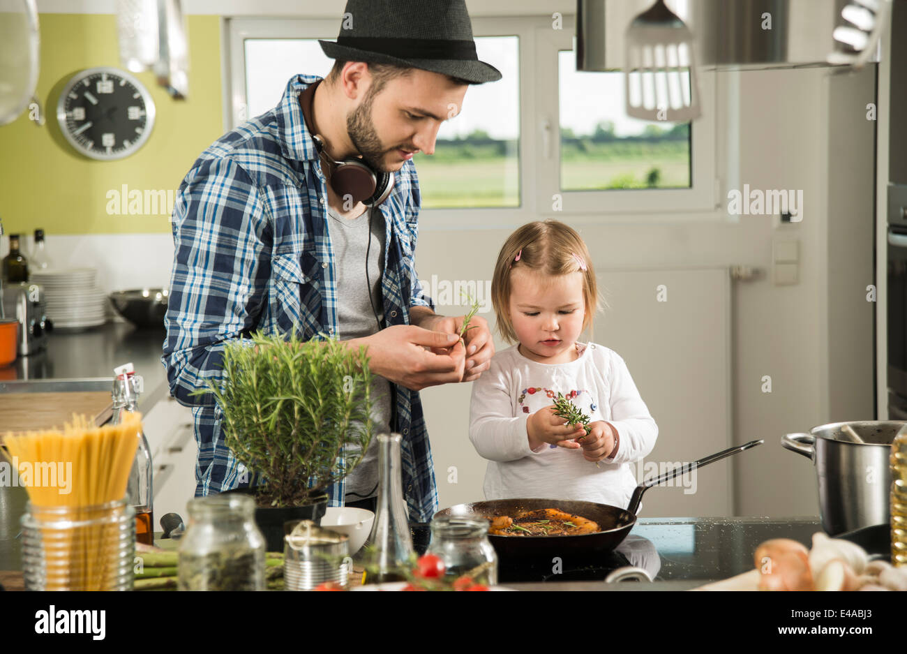 Father and daughter cooking in kitchen Stock Photo - Alamy