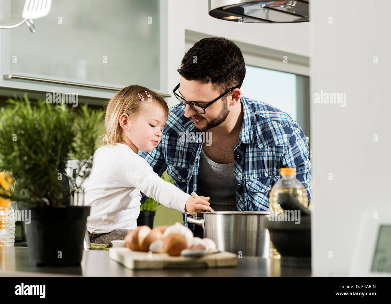 Father and daughter cooking in kitchen Stock Photo - Alamy