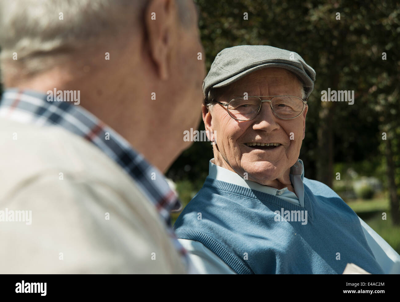 Portrait of happy old man having fun with his friend Stock Photo - Alamy