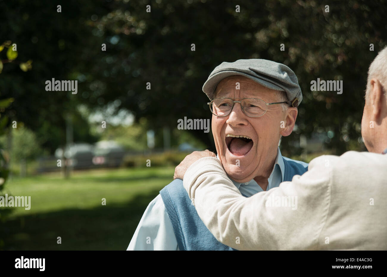 Portrait of happy old man having fun with his friend Stock Photo - Alamy