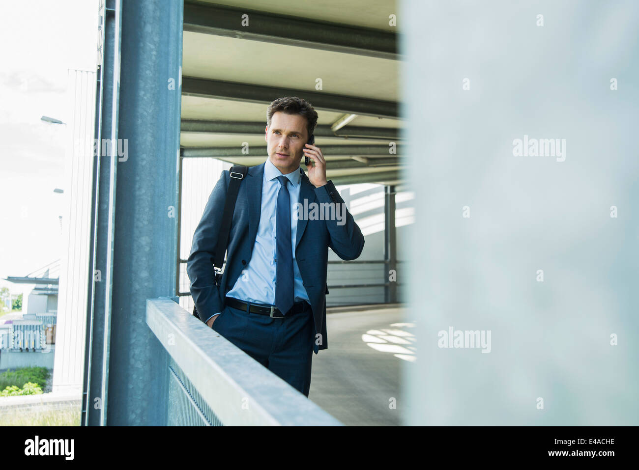 Portrait of business man telephoning with smartphone Stock Photo - Alamy