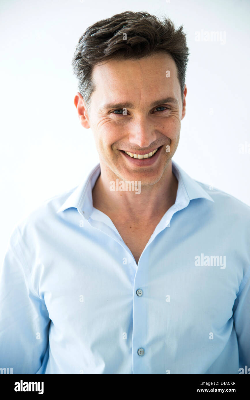 Portrait of smiling business man Stock Photo - Alamy