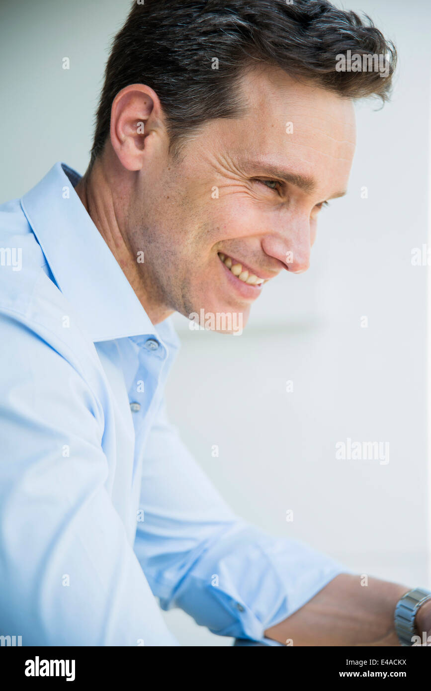 Portrait of smiling business man Stock Photo - Alamy