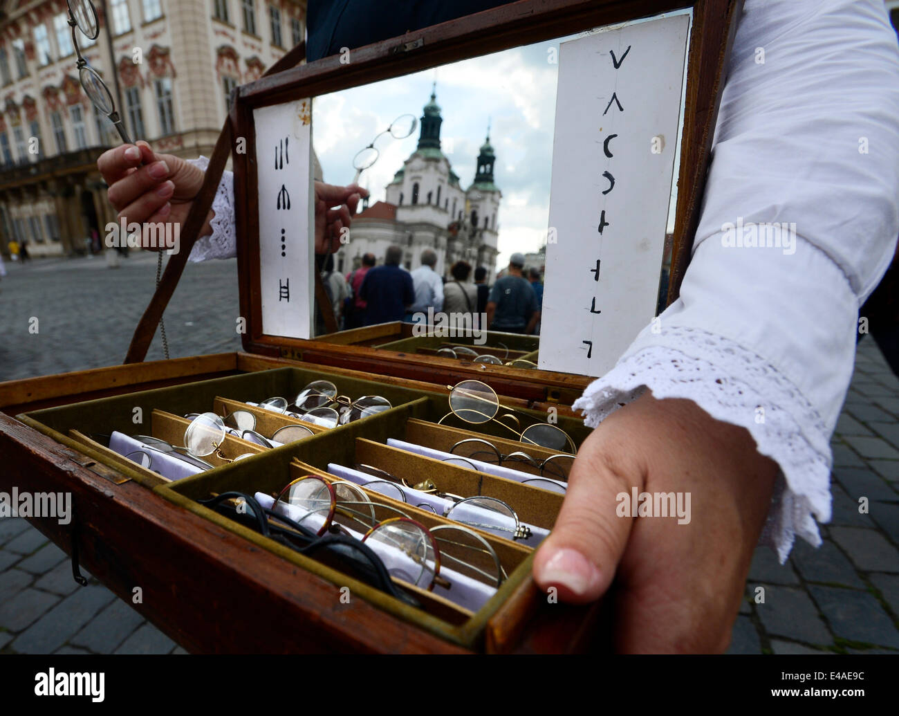A march of Italian artisans in historical costumes in the streets of ...