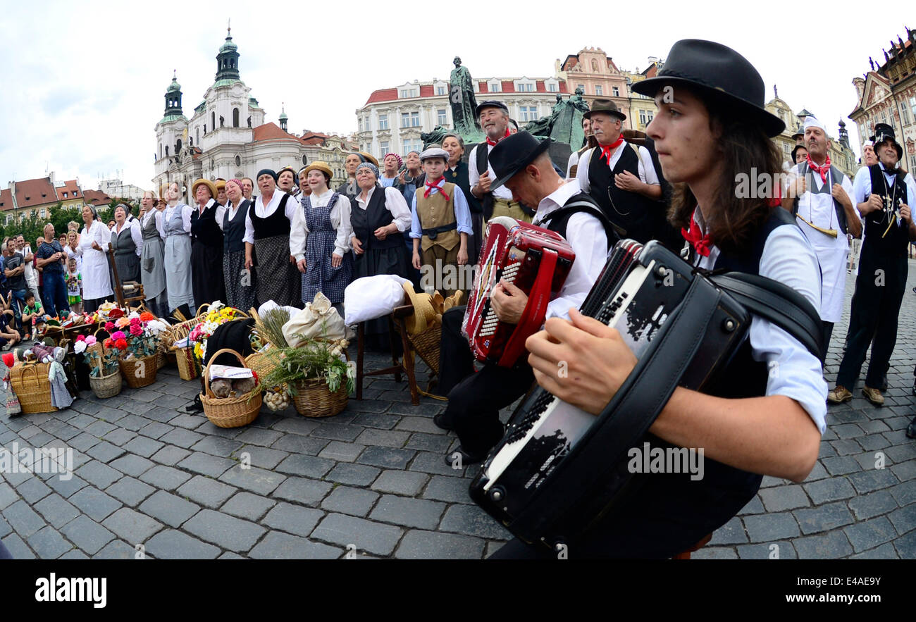 A march of Italian artisans in historical costumes in the streets of ...
