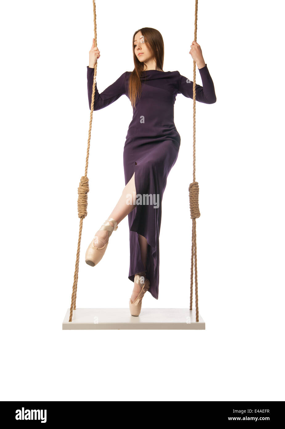 young beautiful ballet dancer posing on swing Stock Photo - Alamy