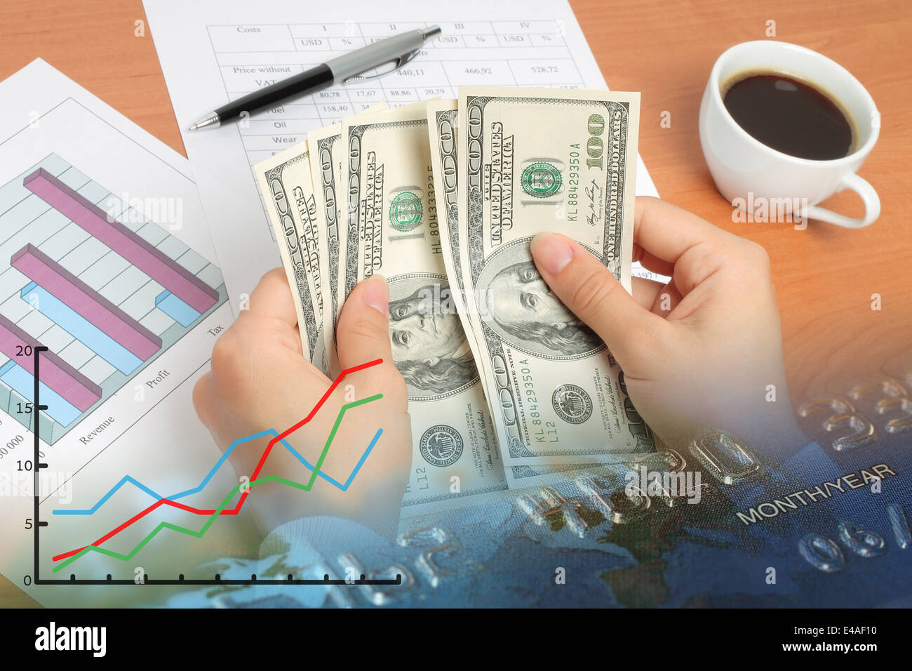 Businesswoman counting money at her workplace Stock Photo - Alamy