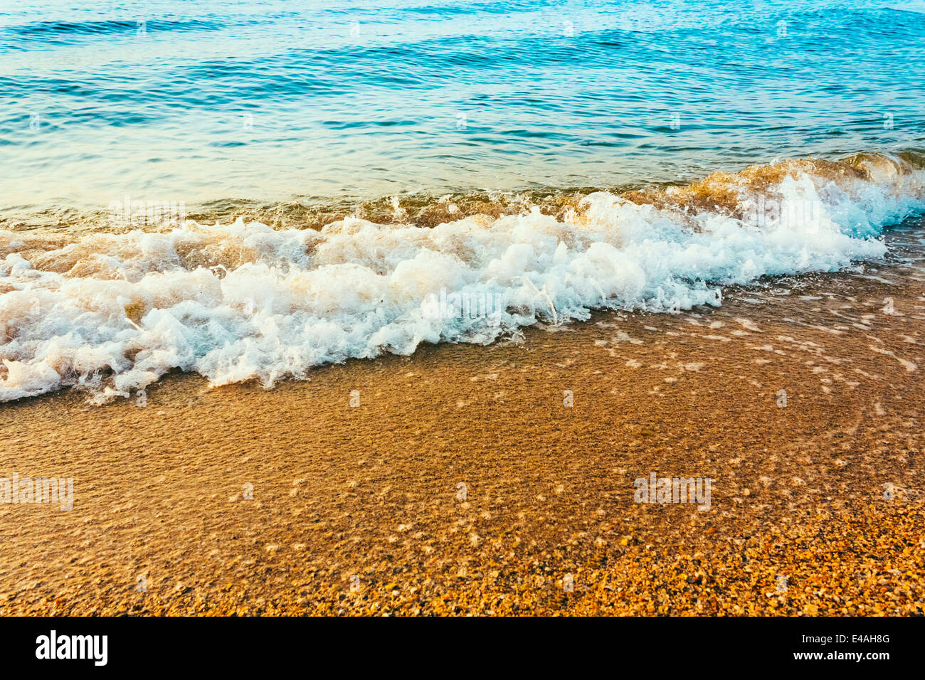 Soft Sea Ocean Waves Wash Over Golden Sand Background Stock Photo - Alamy