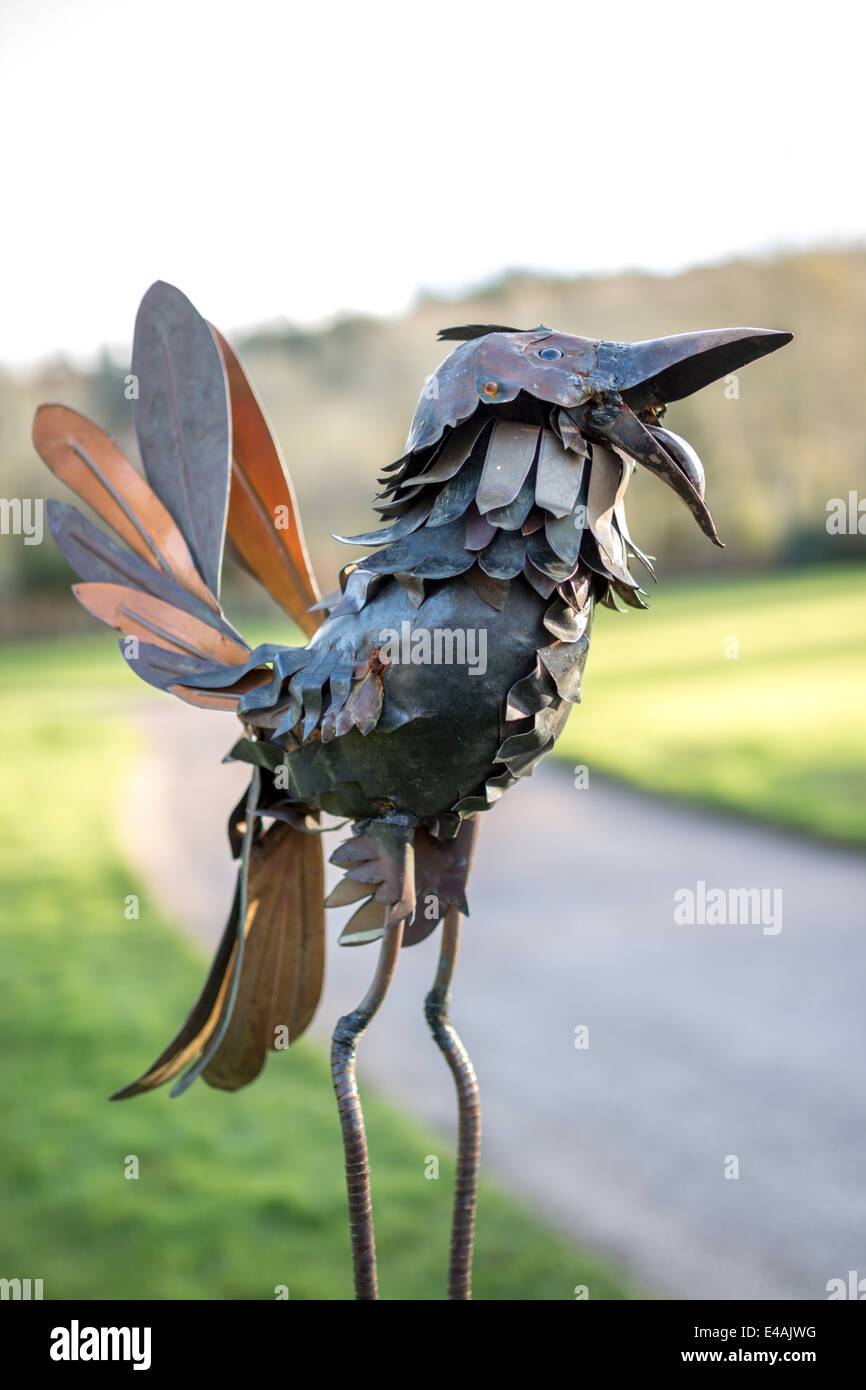 a crow sculpture in a garden Stock Photo - Alamy