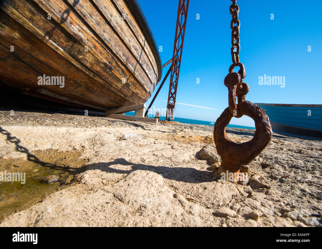 Close up of a chain on a boat lift at Portland Bill in Dorset, England ...