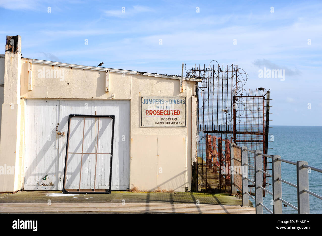 Bognor Regis West Sussex UK - The derelict old pier with warning sign ...