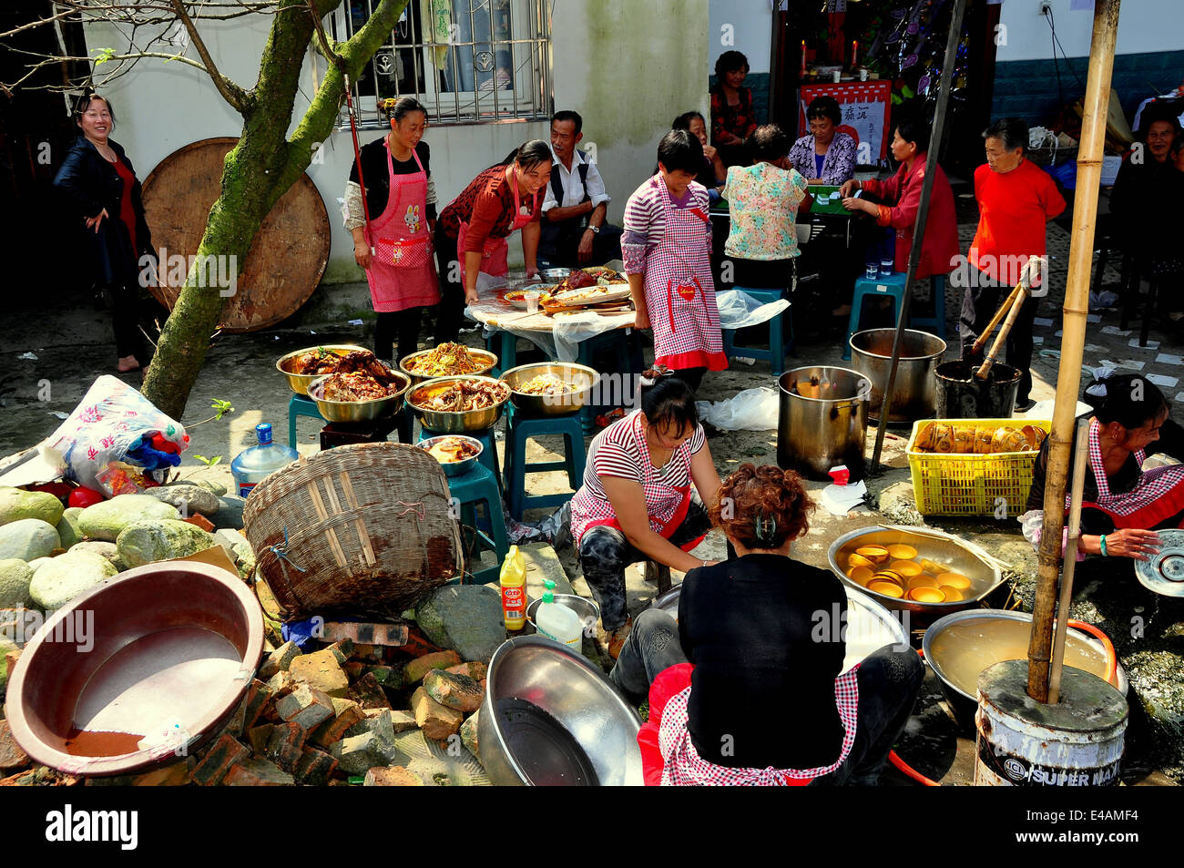 PENGZHOU, CHINA: A large gathering of people with copious amounts of ...