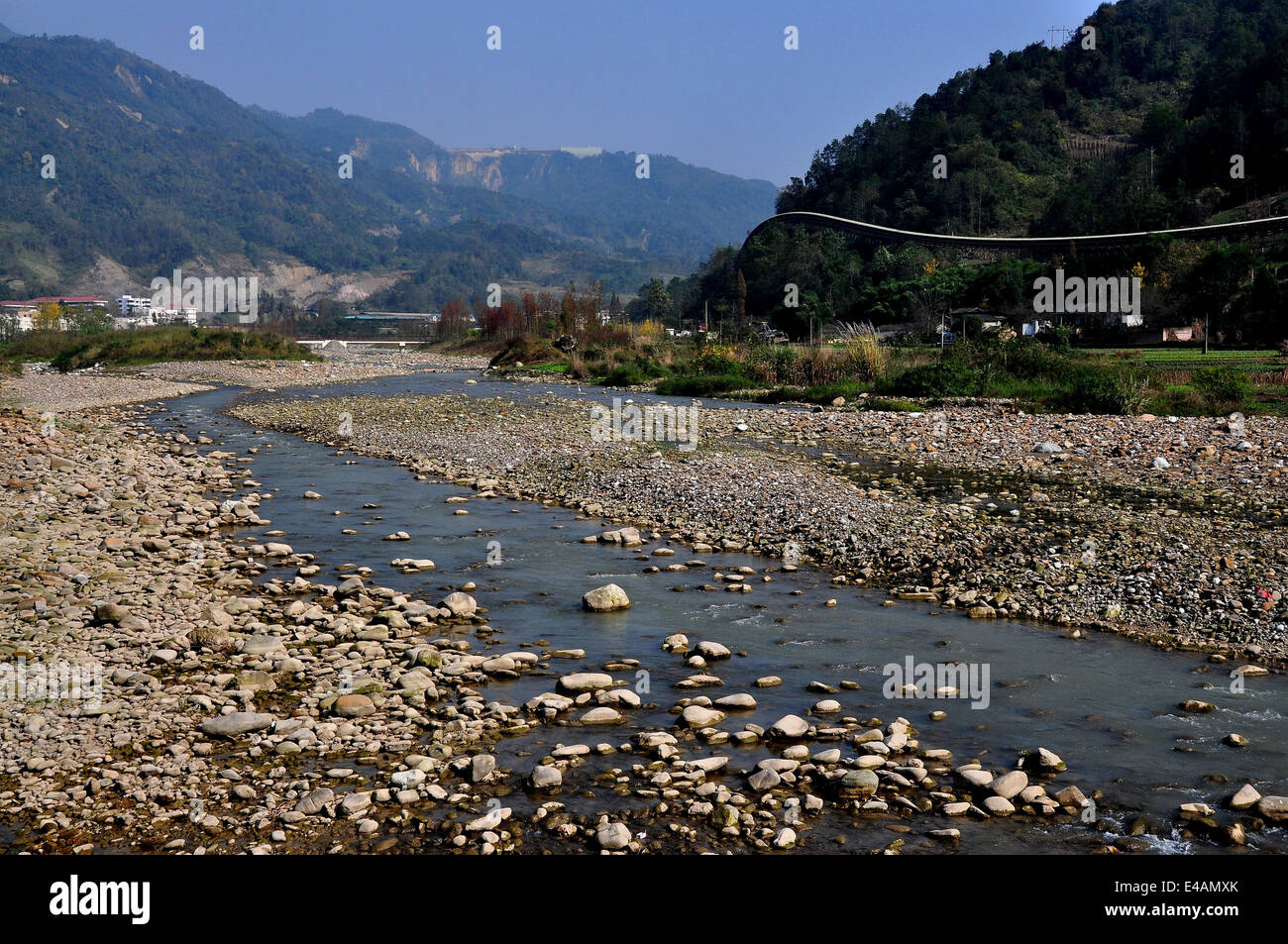 SICHUAN PROVINCE, CHINA: The rock strewn JianJiang River courses ...