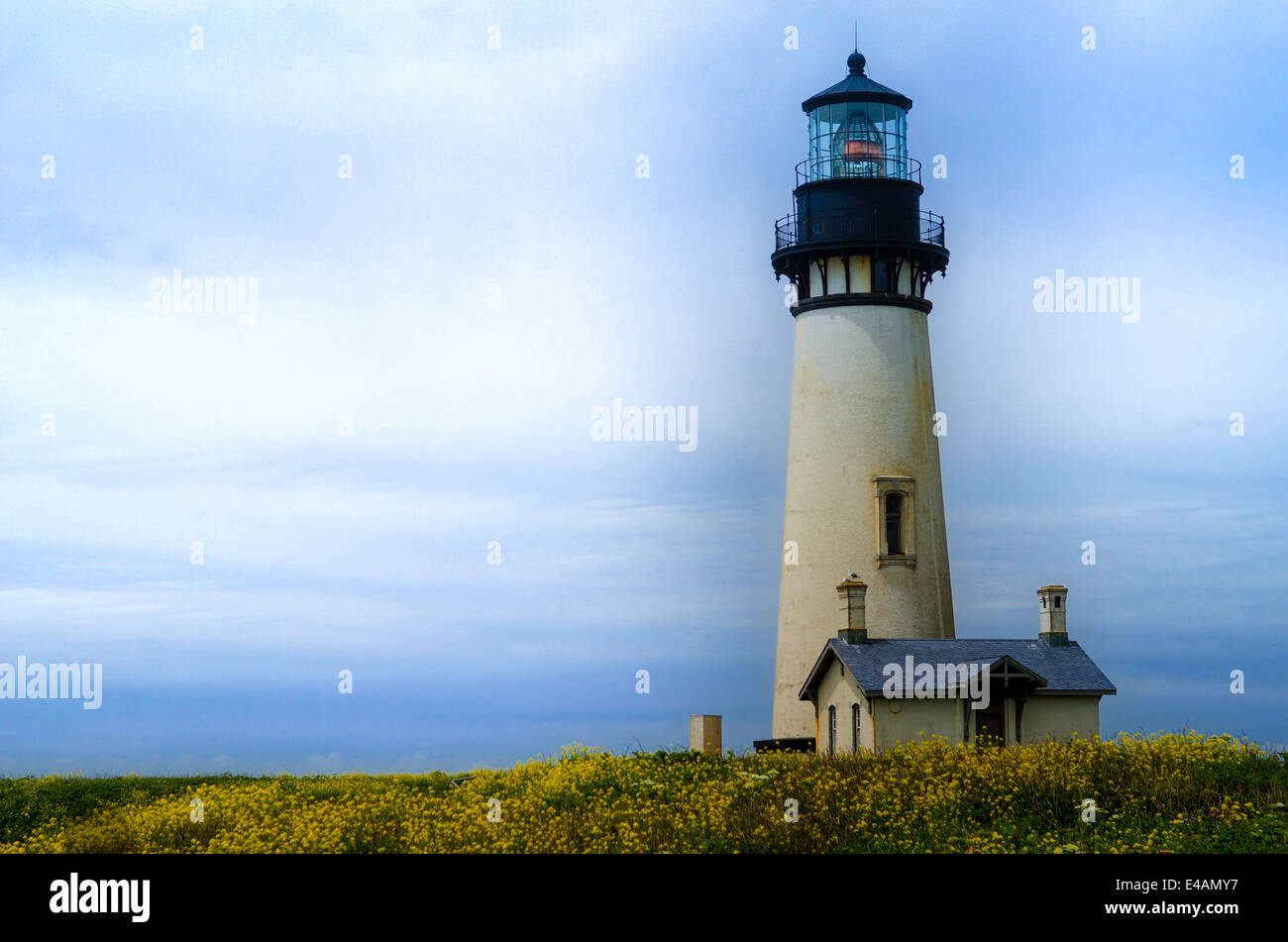 Solitude by the lighthouse Stock Photo - Alamy