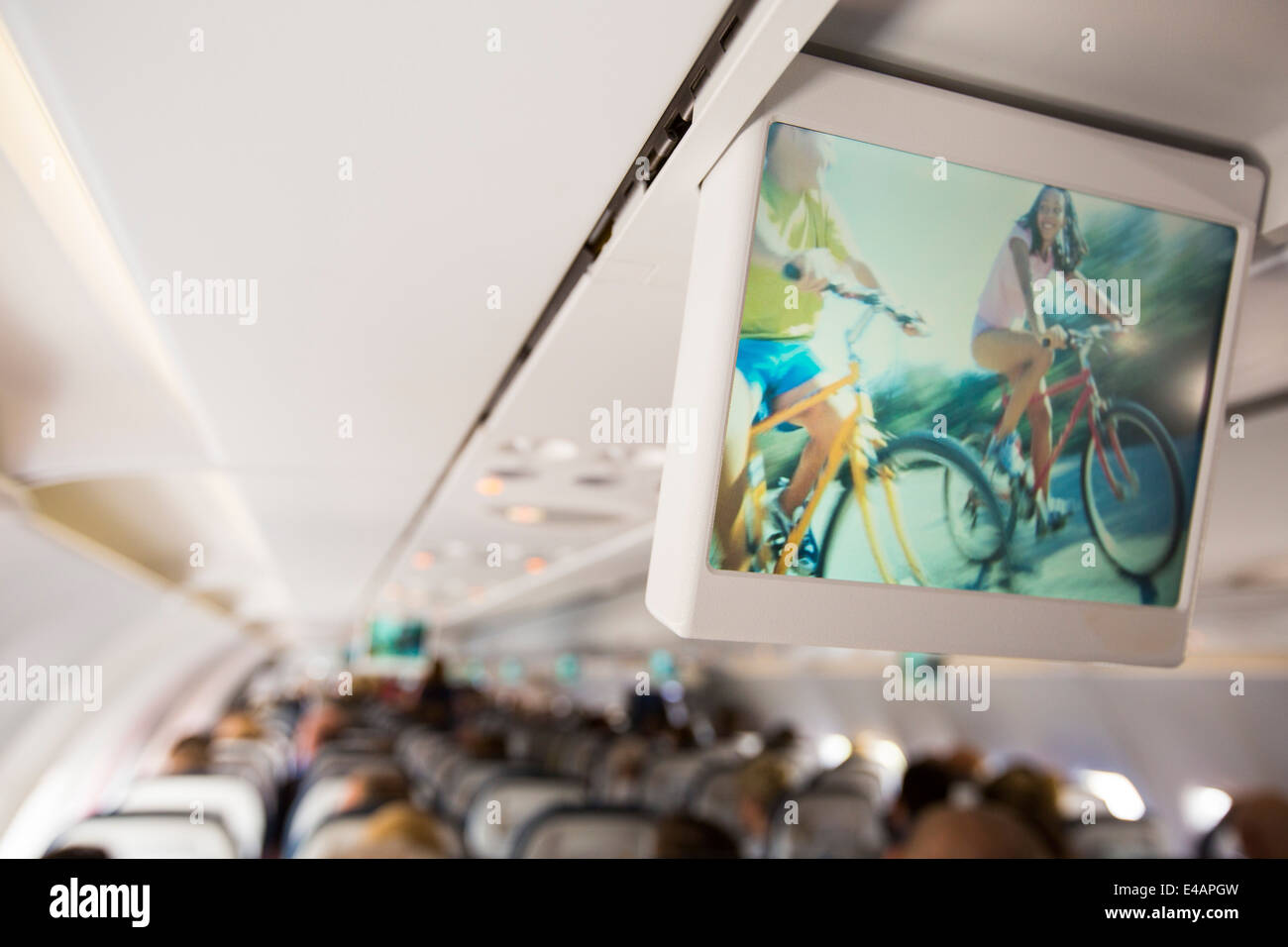 A TV in an airplane Stock Photo - Alamy