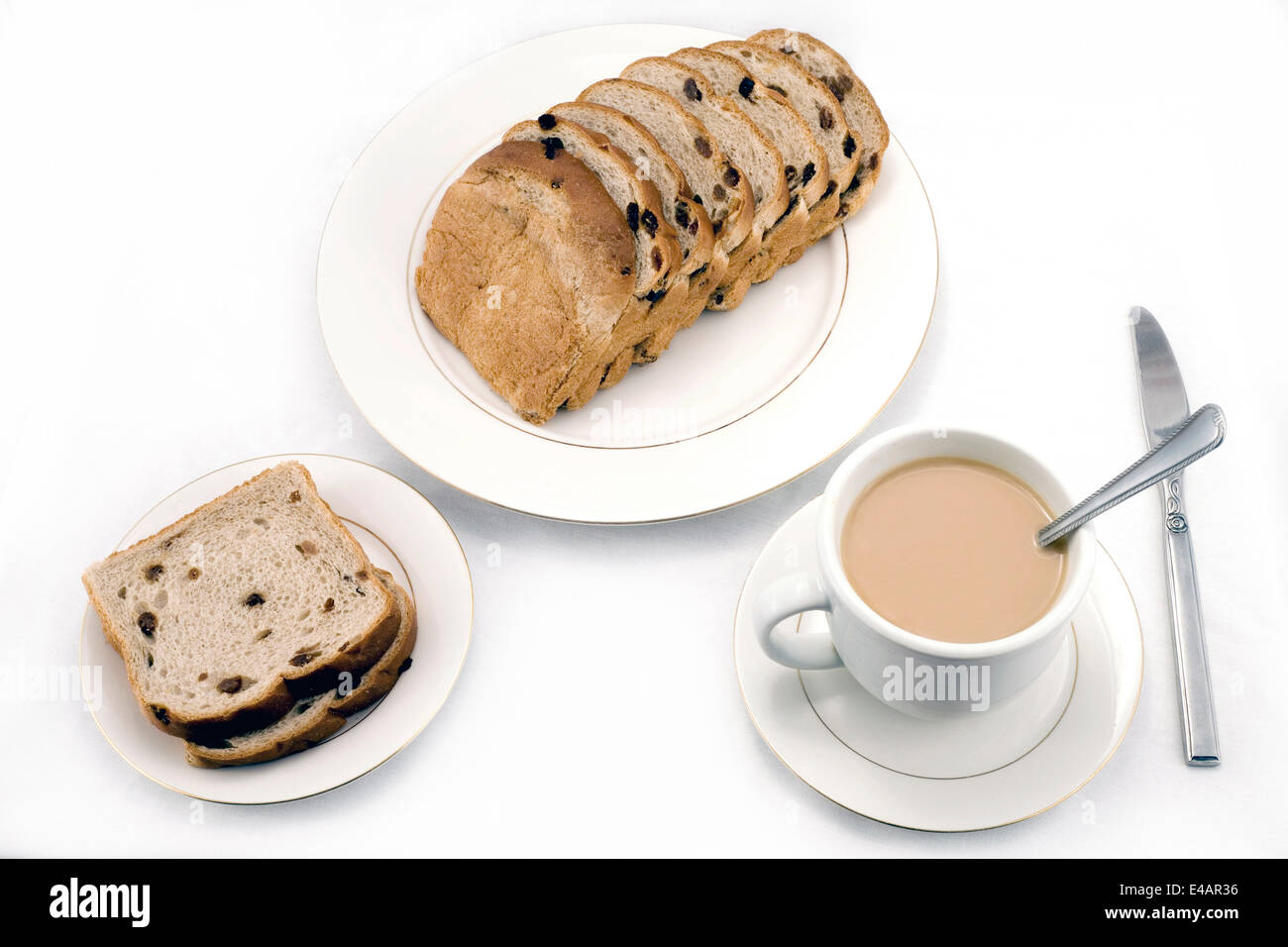 table top with raison bread loaf and coffee Stock Photo - Alamy