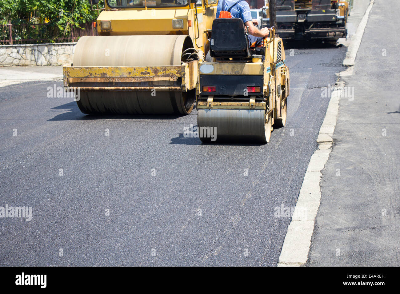 Compactor roller during road construction at asphalting work Stock ...