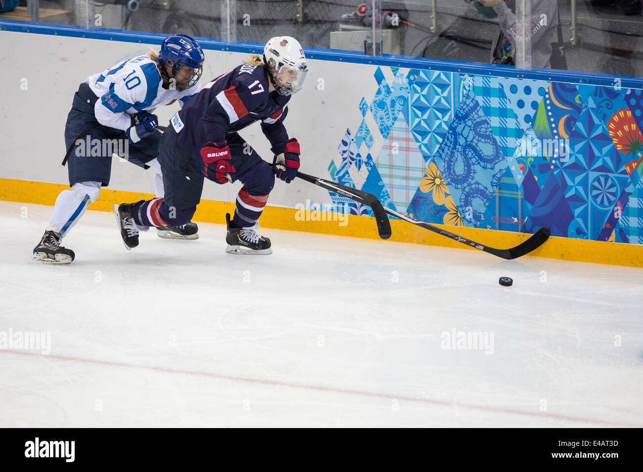 Jocelyne Lamoureux (USA) and Linda Valimaki (FIN) during ice hockey ...