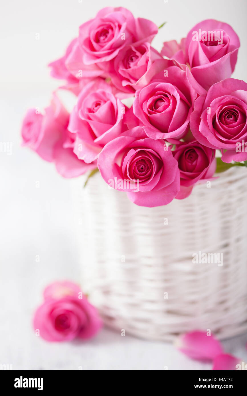 beautiful pink roses bouquet in basket Stock Photo - Alamy