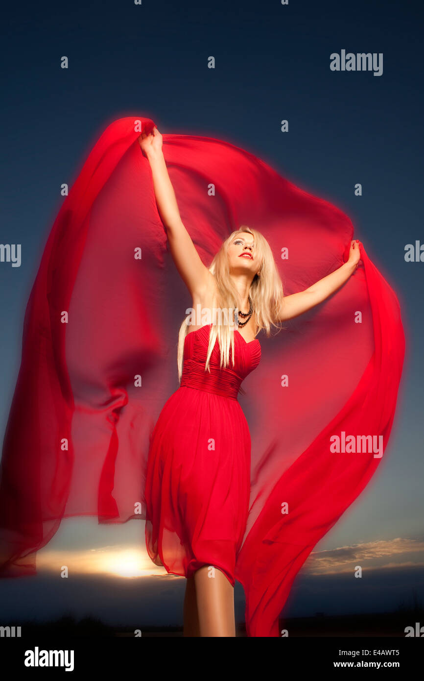 Beautiful woman dancing in sunlight Stock Photo - Alamy