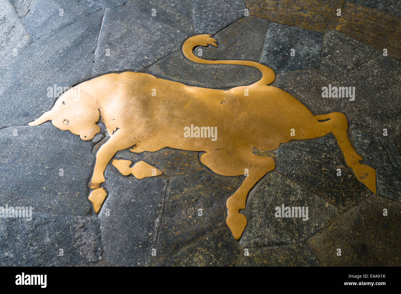 Turin city symbol - the rampant bull. In brass in the stone pavement ...