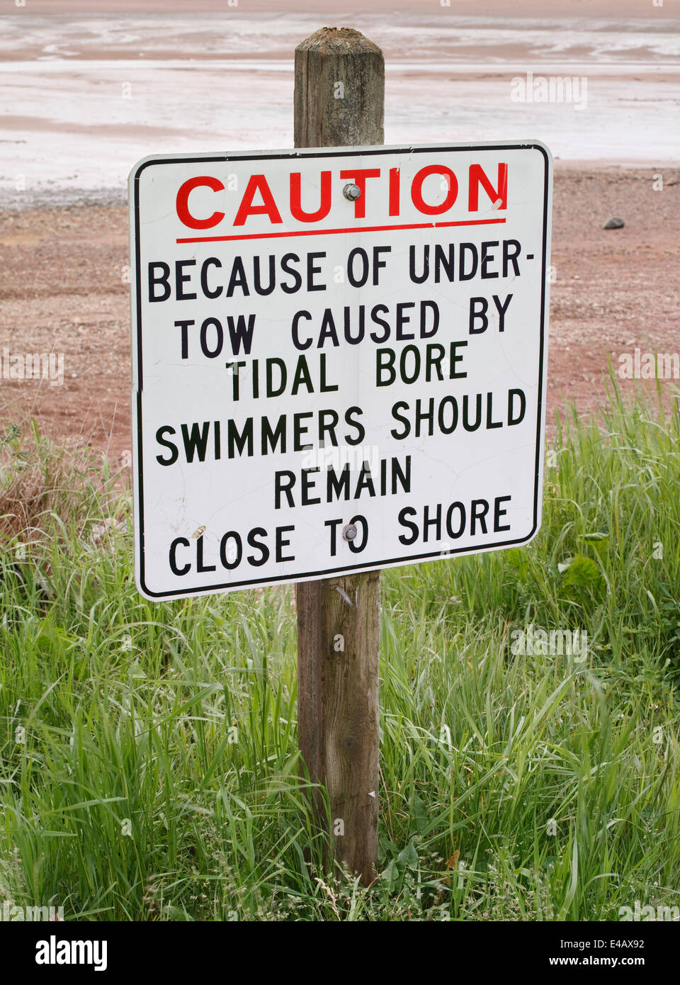 Sign - Undertow warning for swimmers Stock Photo - Alamy