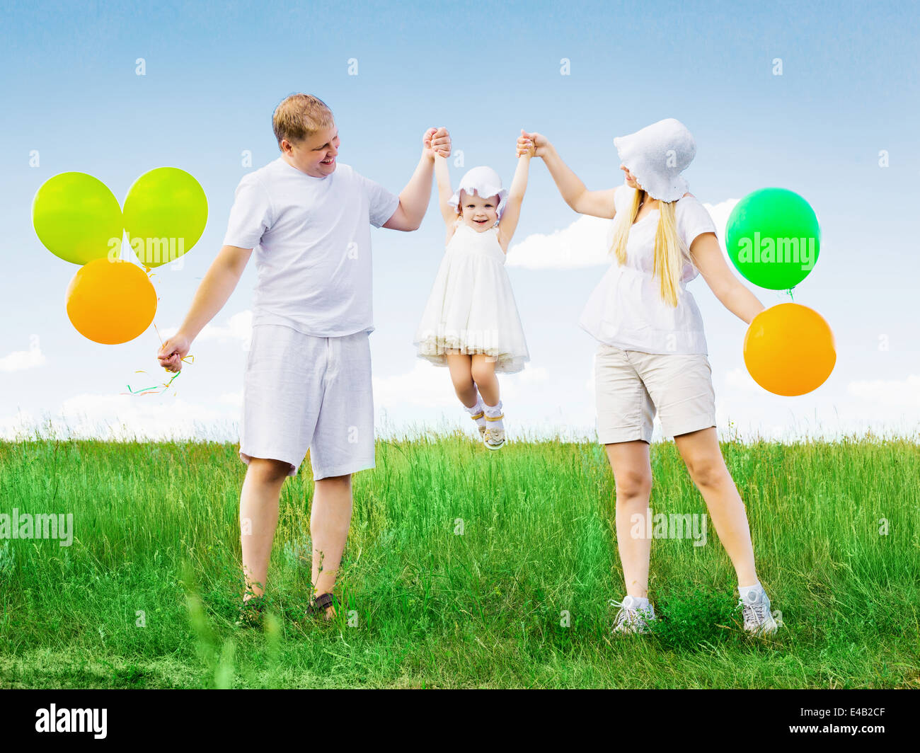 happy family outdoor on a summer day Stock Photo - Alamy