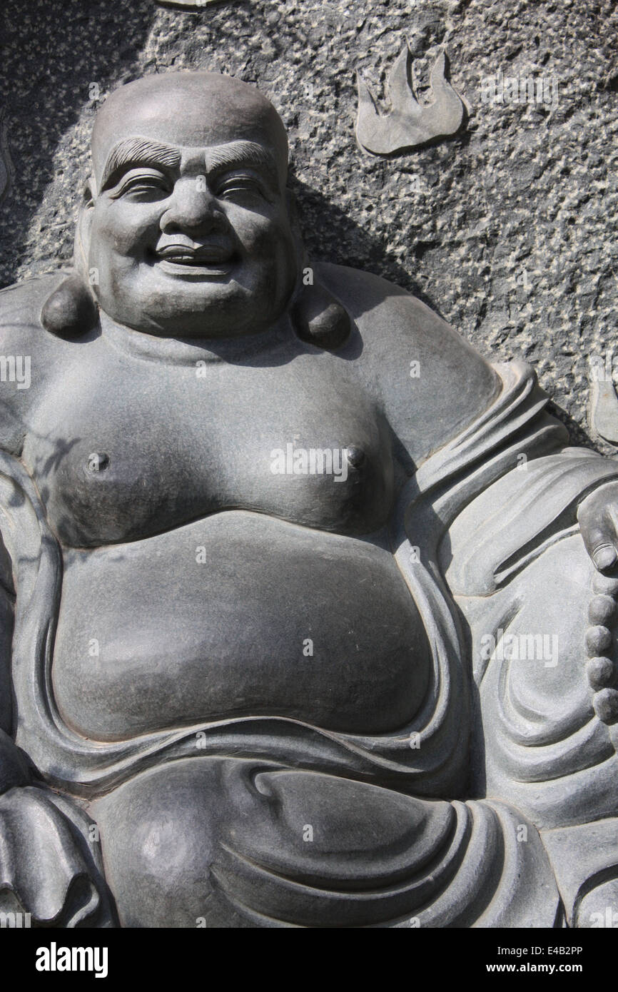 Old happy buddha statue hi-res stock photography and images - Alamy