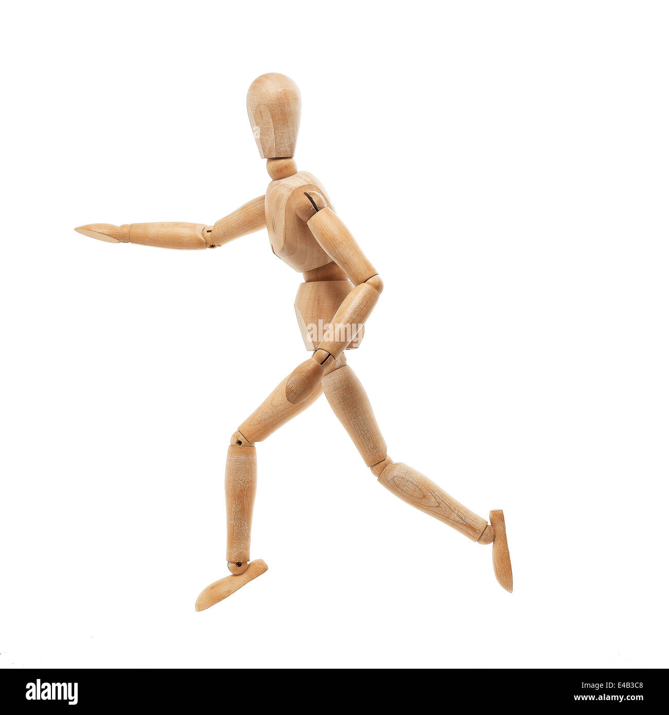 Wood model with running pose isolated on white background Stock Photo ...