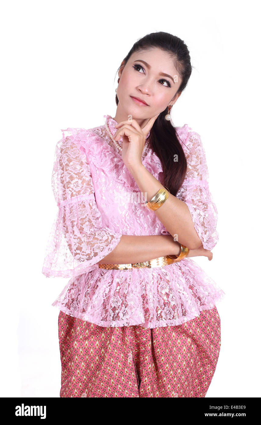 woman wearing typical thai dress thinking isolated on white background ...