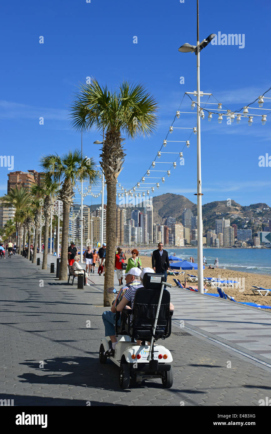 Mobility scooter on seafront promenade, Playa de Levante, Benidorm ...