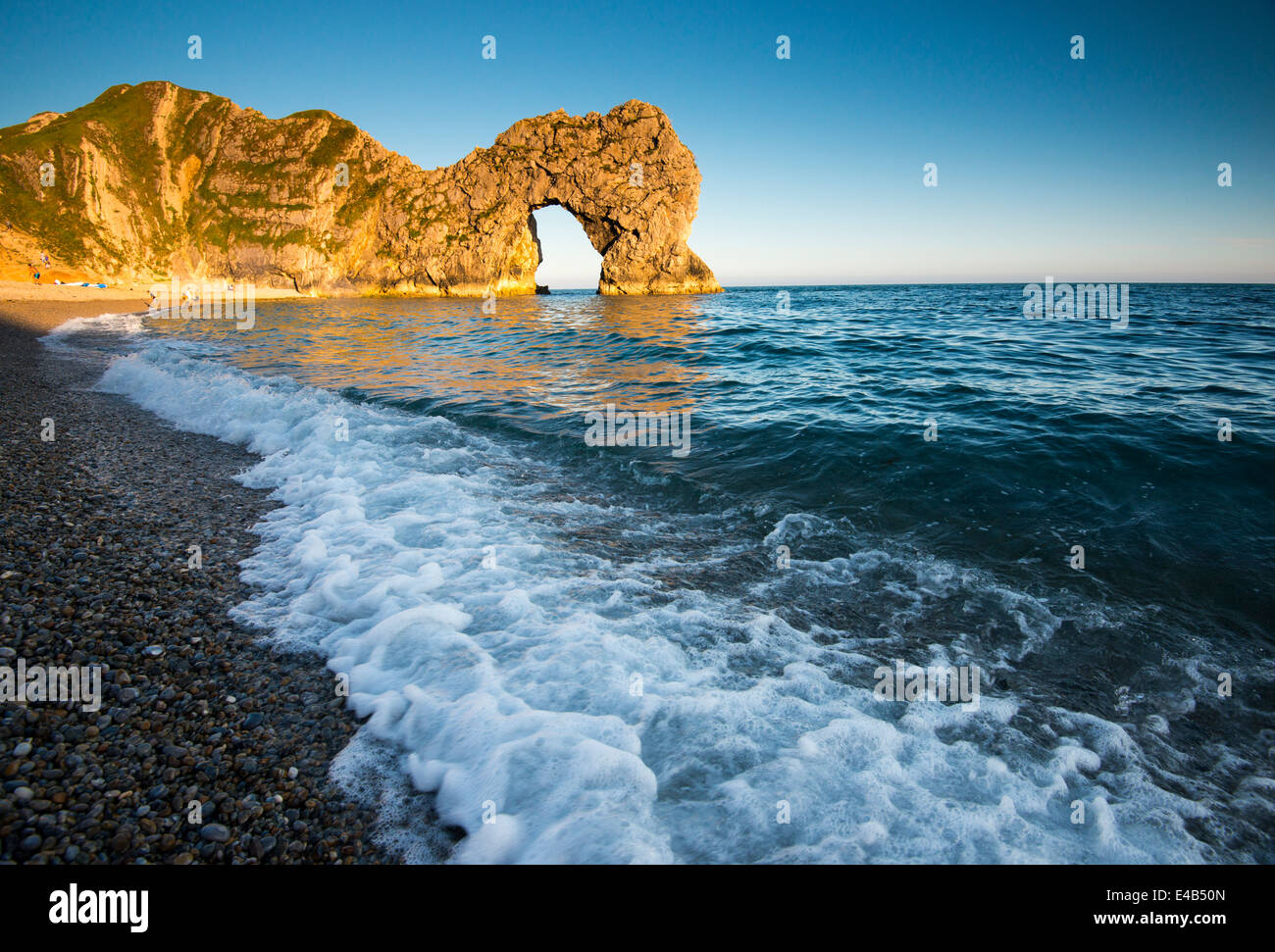 A sunny summer evening at Durdle Door, Dorest England UK Stock Photo ...