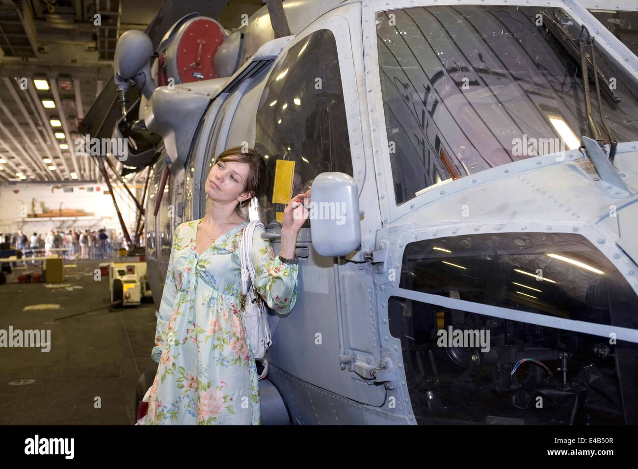 Young girl stands next to a Sikorsky Seahawk helicopter Stock Photo - Alamy