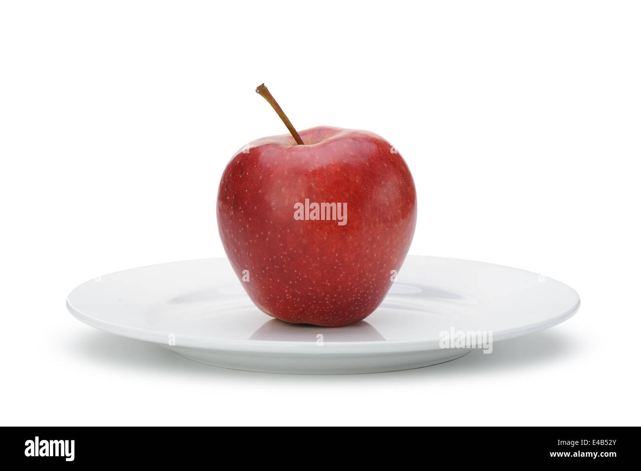 Red apple on plate Stock Photo - Alamy