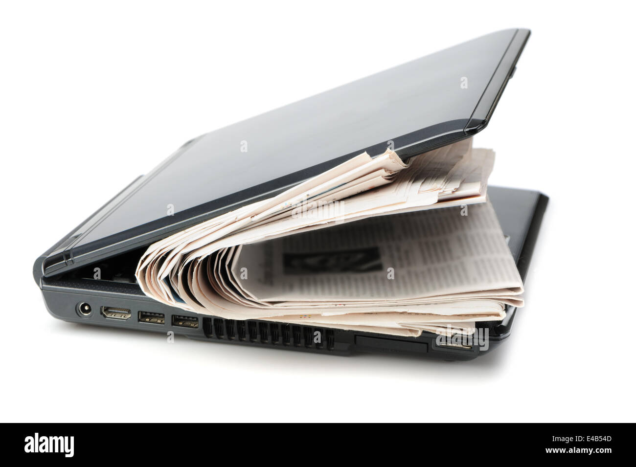 Laptop newspaper black background hi-res stock photography and images ...