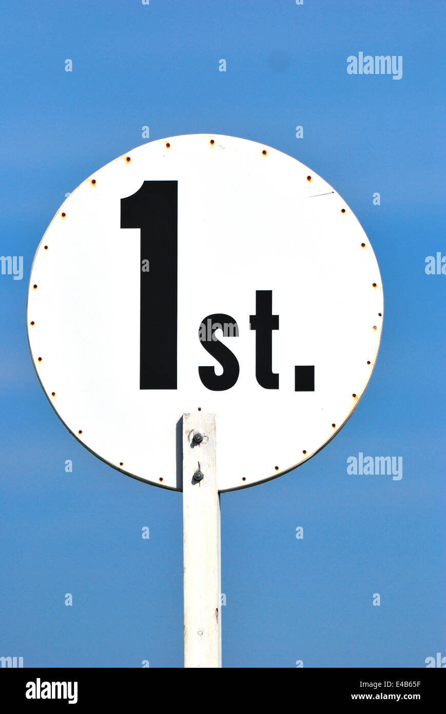 first place wooden sign Stock Photo - Alamy