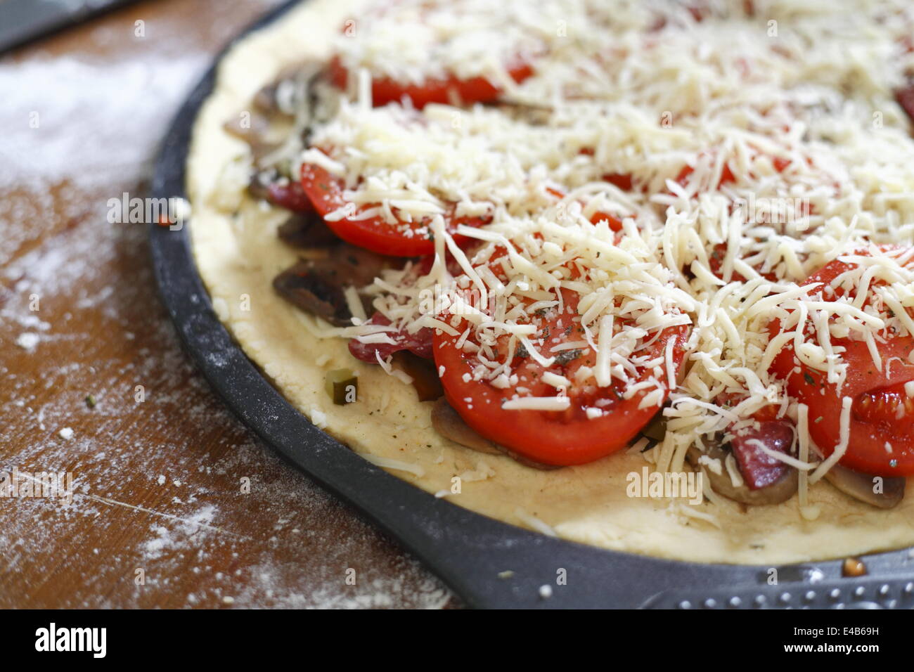Uncooked Homemade Pizza Stock Photo - Alamy