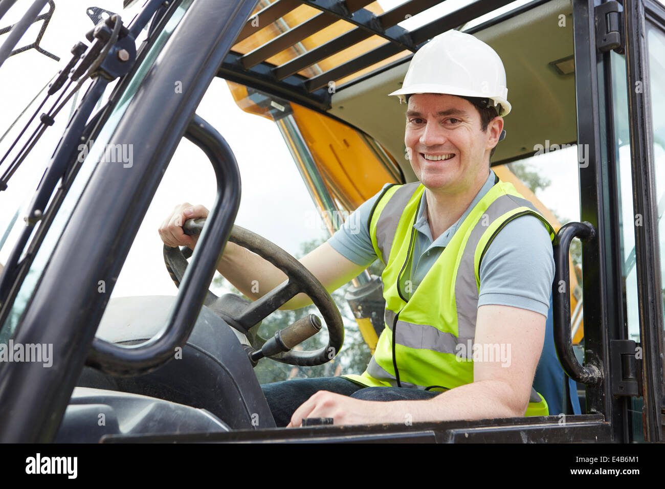 Portrait Of Construction Worker Driving Digger Stock Photo - Alamy