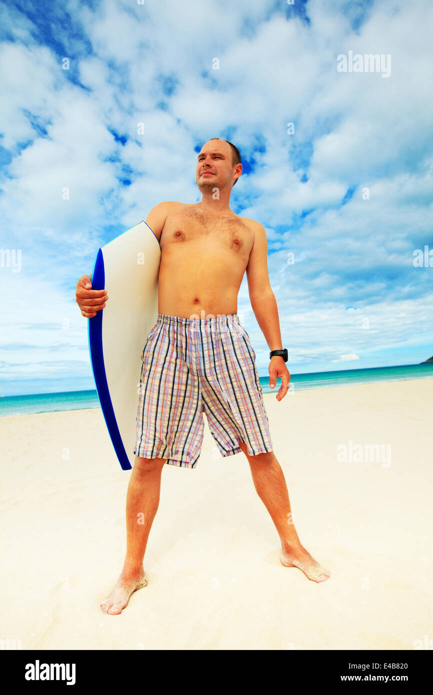 Man with body board Stock Photo - Alamy