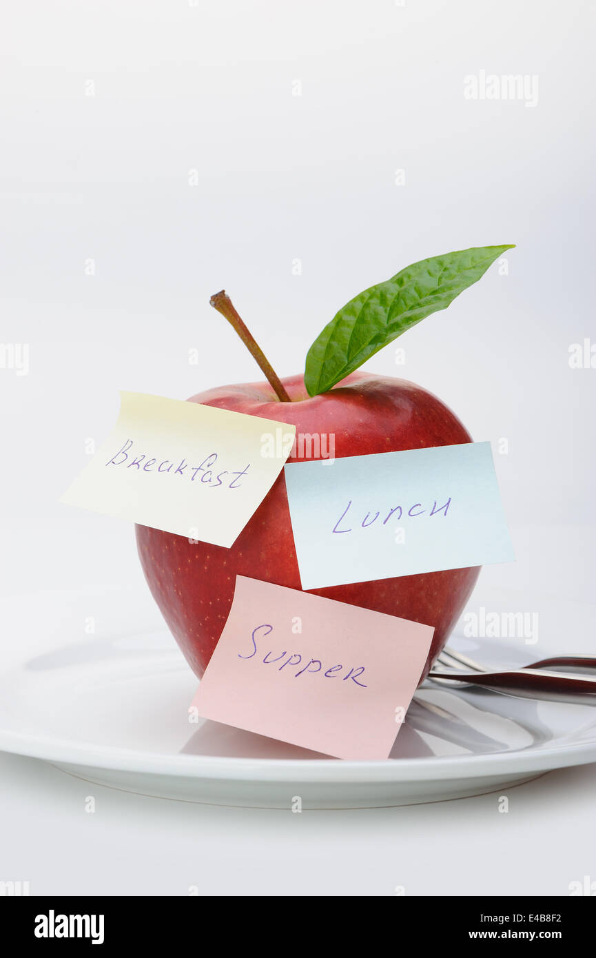 Apple with paper notes Stock Photo - Alamy