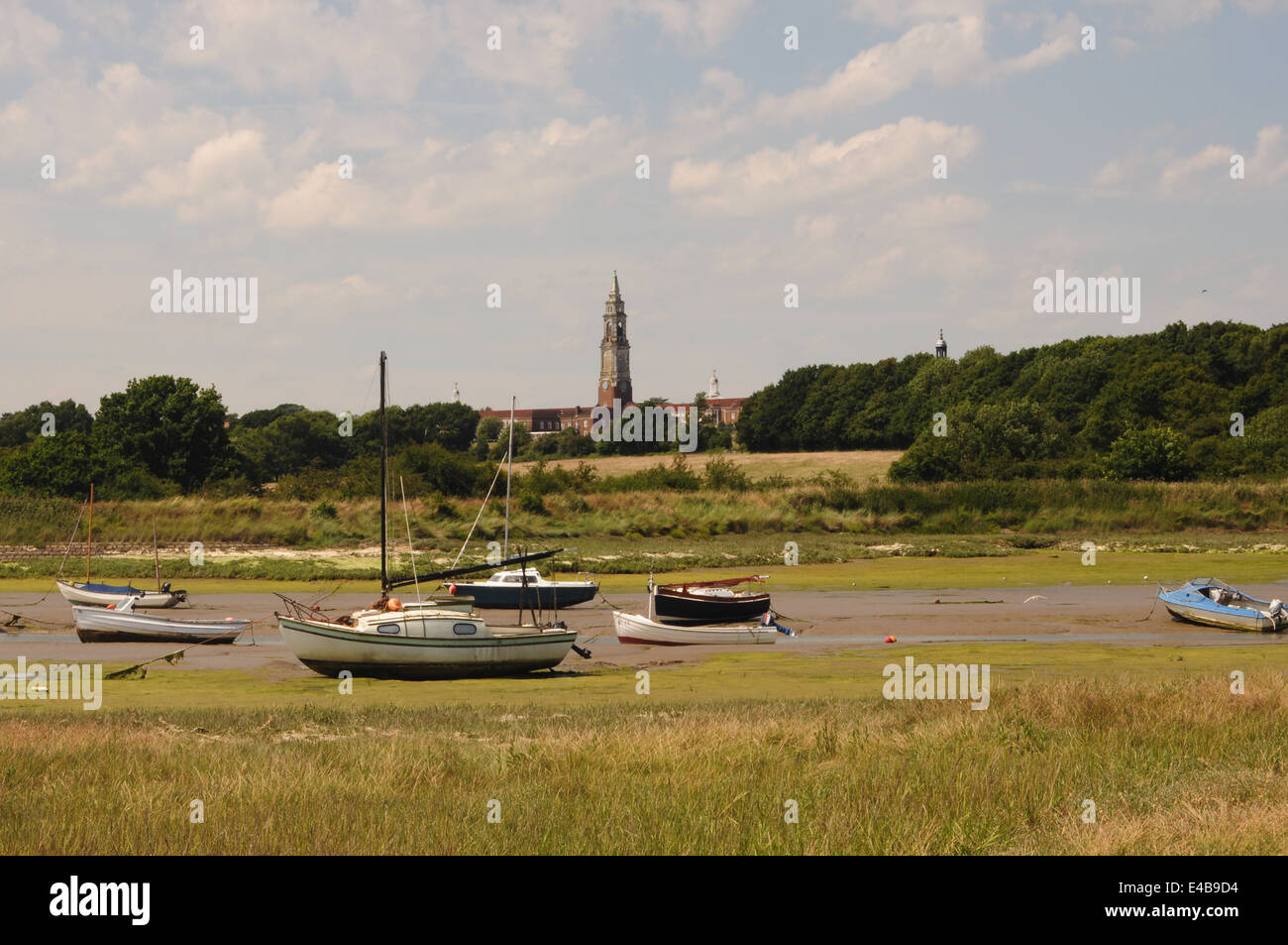Holbrook Bay on the River Stour, Suffolk, U with the spire of the Royal ...