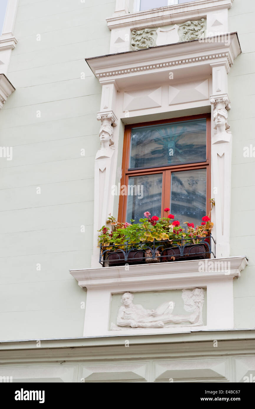 Facade of a building with windows Stock Photo - Alamy